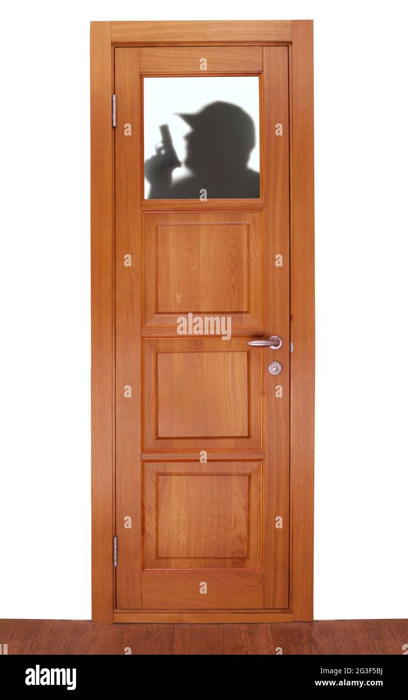 Shade of stranger on the window of door from a dark tree Stock Photo ...