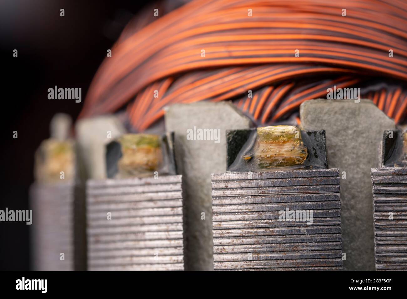 Rotor of an electric motor close up. Copper motor windings Stock Photo ...