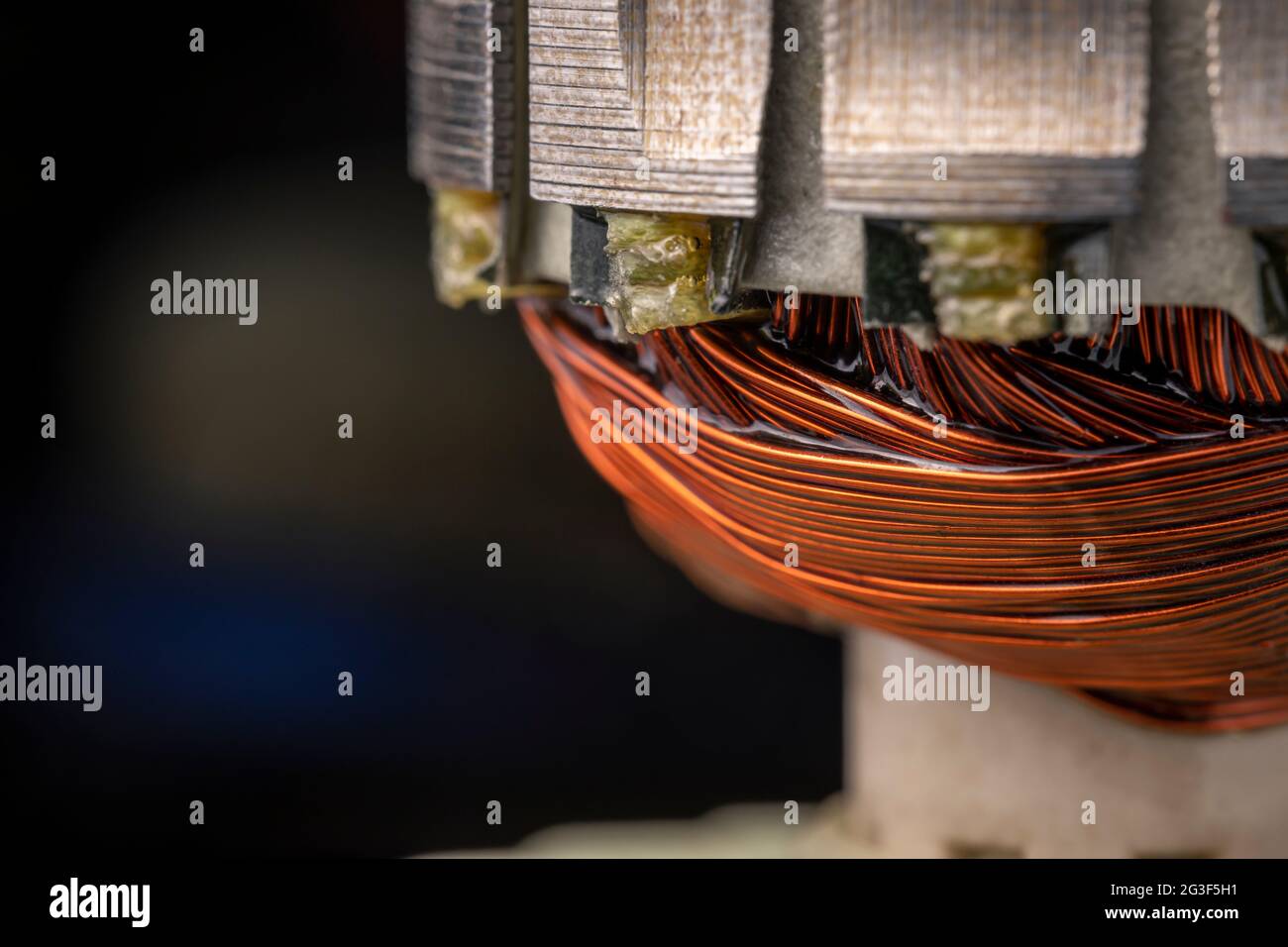 Rotor of an electric motor close up. Copper motor windings Stock Photo ...