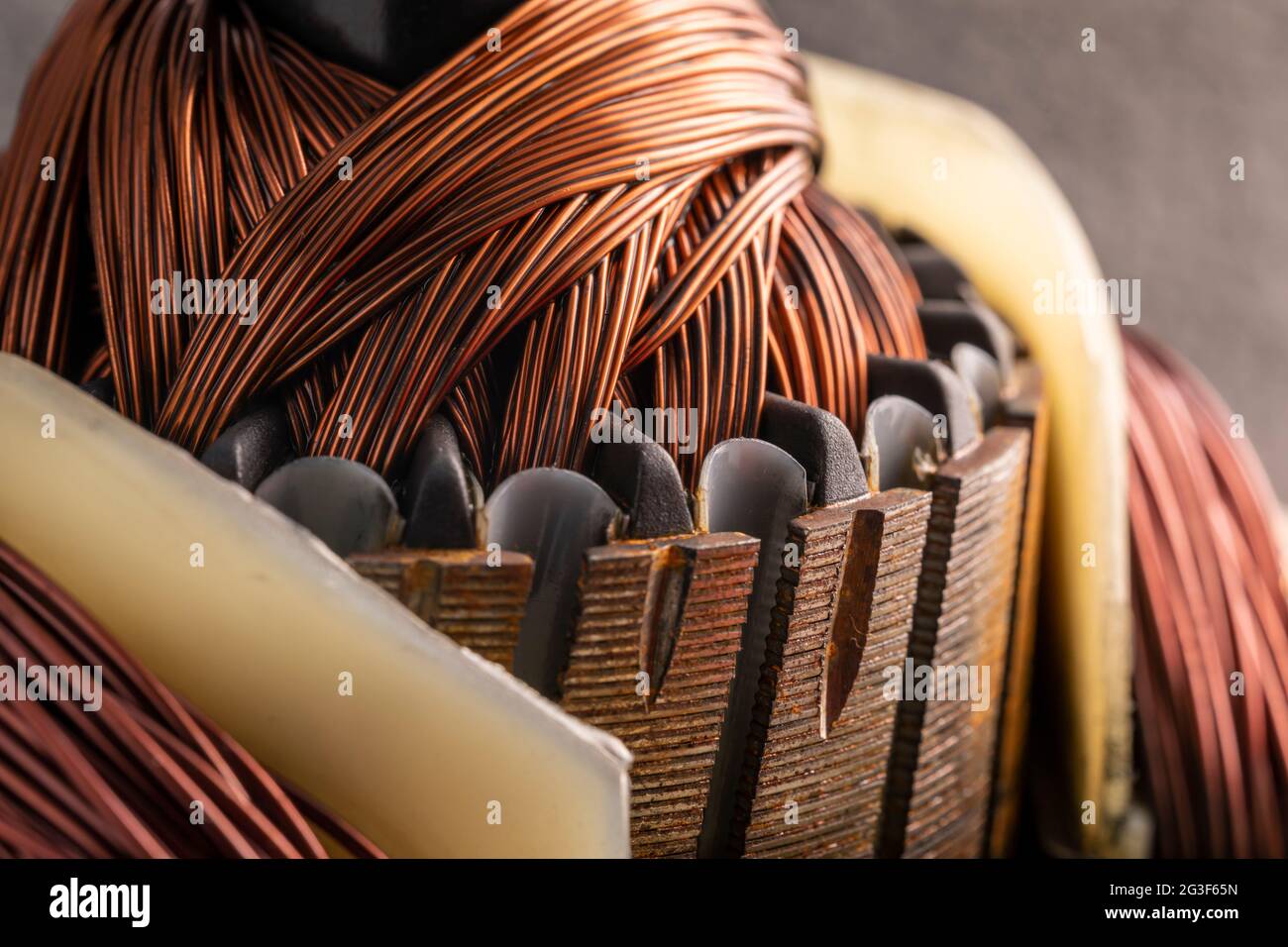 Rotor of an electric motor close up. Copper motor windings Stock Photo ...