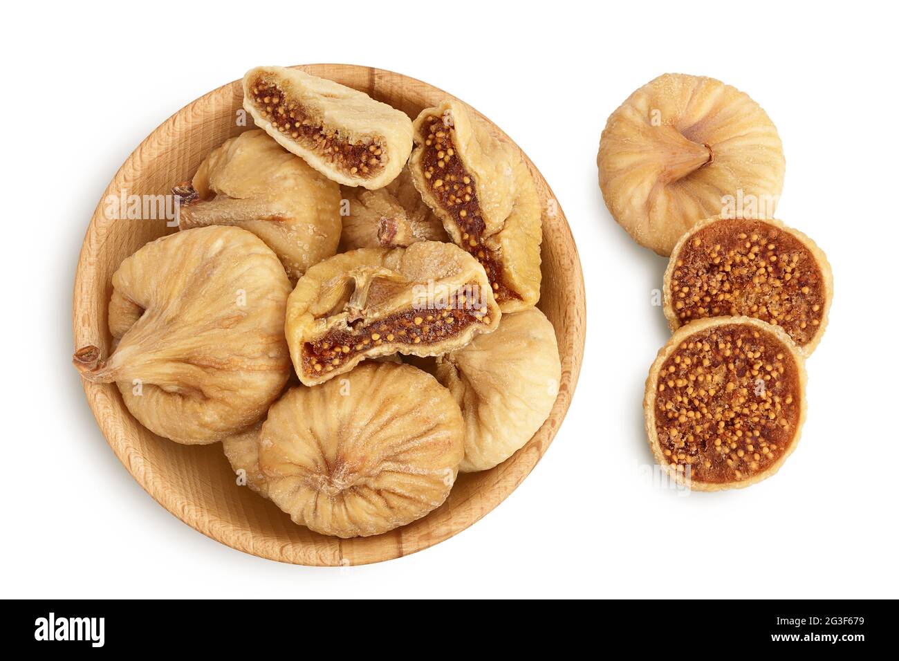 dried fig in wooden bowl isolated on white background with clipping ...
