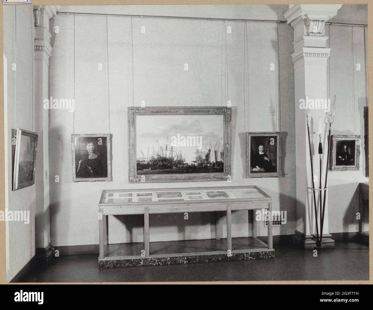 Hall 113 Seen to West with paintings, a laying eggshield and weapons ...
