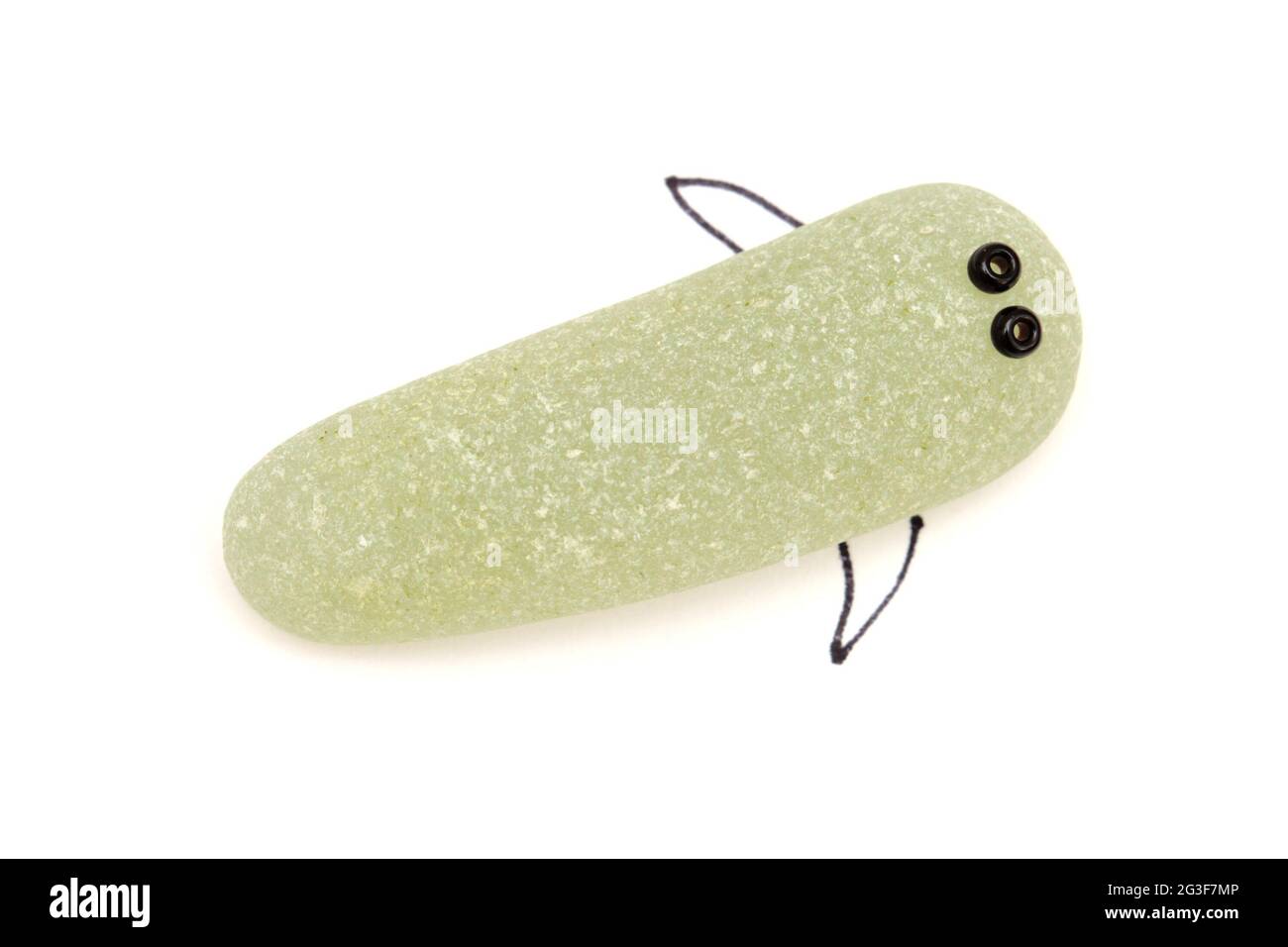 funny little fish made of a piece of seaglass, with sketchily drawn ...