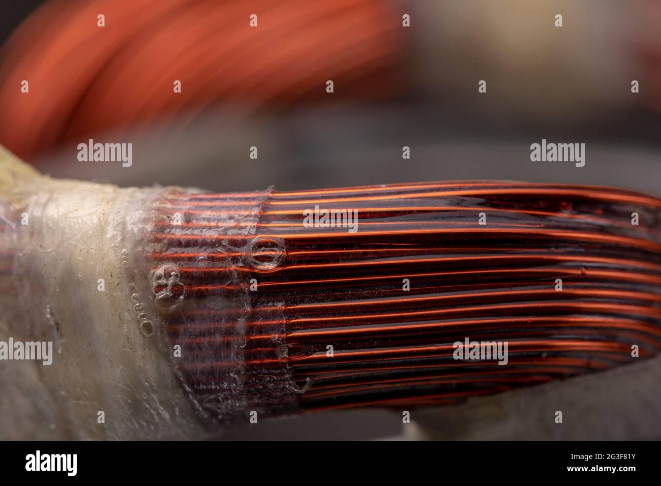 Stator of an electric motor. Close up of a winding of an electric motor ...