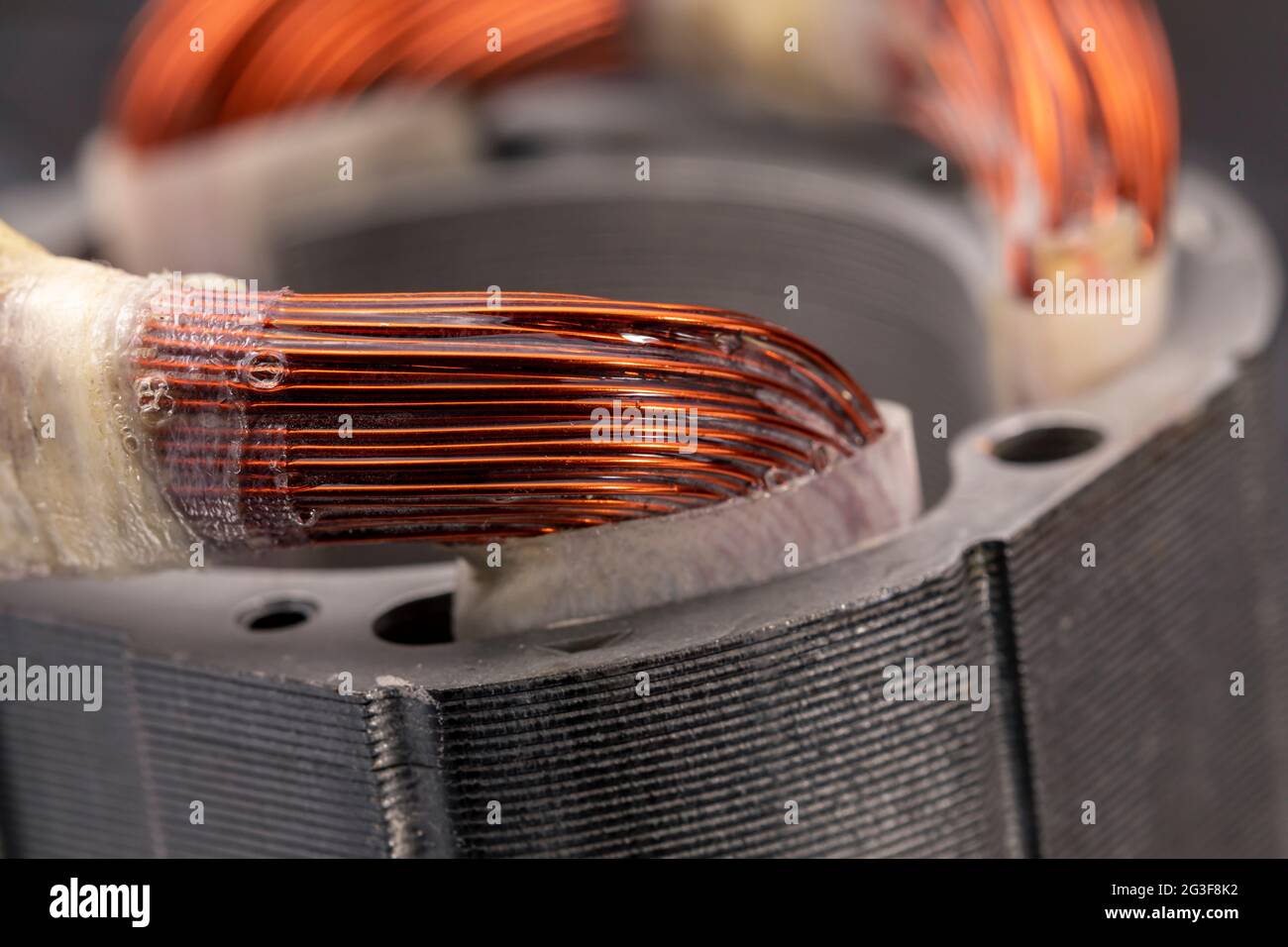 Stator of an electric motor close up. Copper motor windings Stock Photo ...
