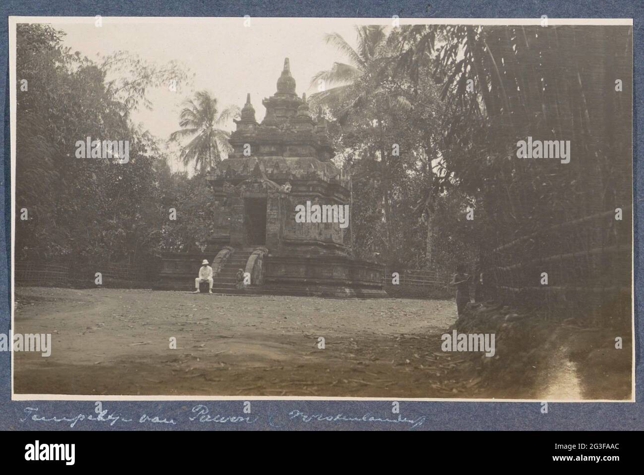 Temple of Pahon at the Borobudur on Java, on the stairs a European ...
