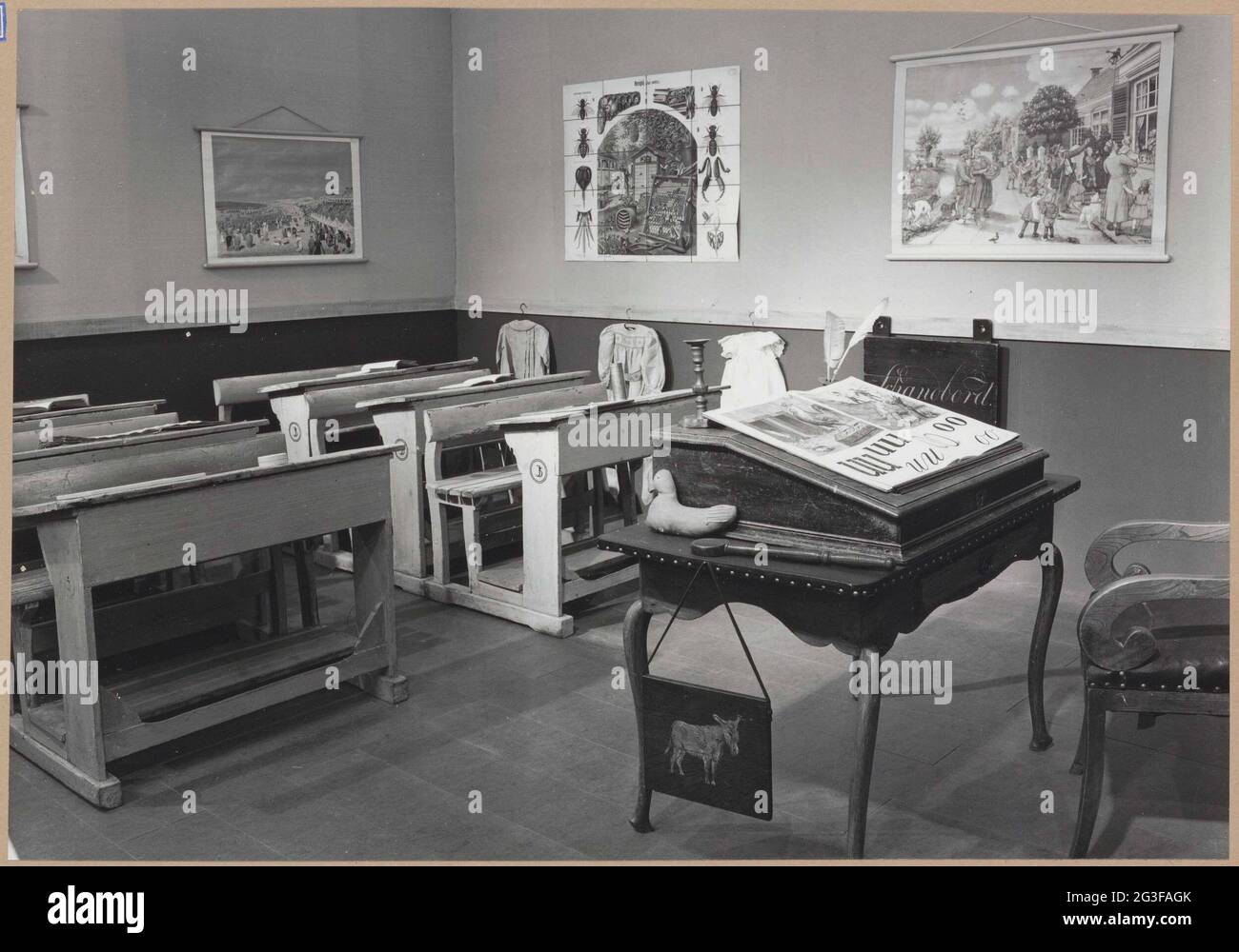 Space furnished as an old school class; Living and working in the ...