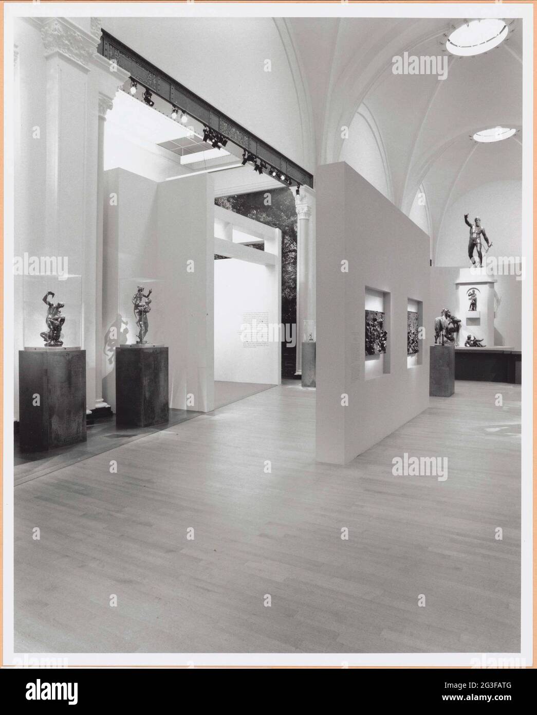 Room with links Two images in showcases, in the middle Two reliefs on a ...