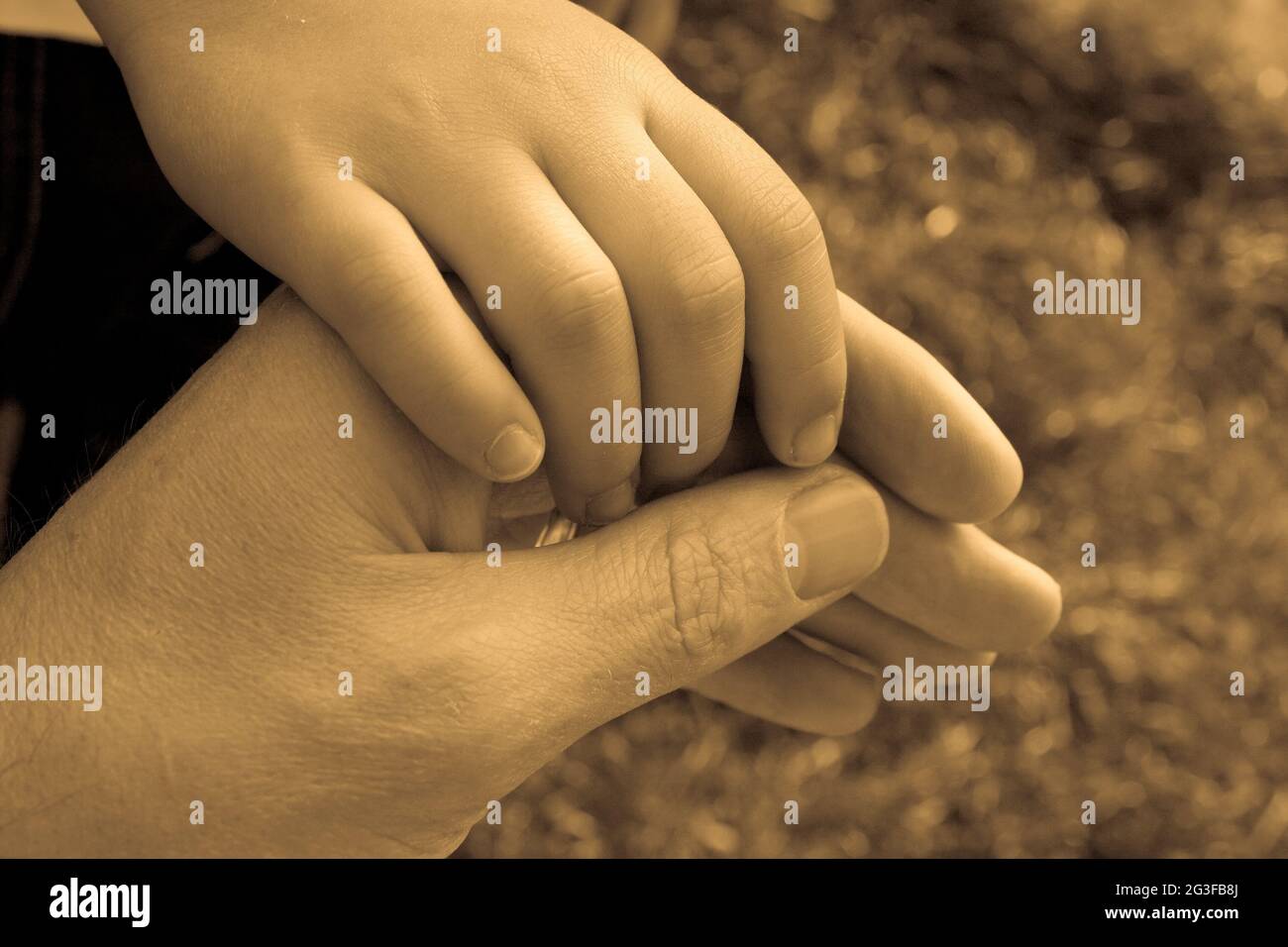 Hand in hand Stock Photo - Alamy