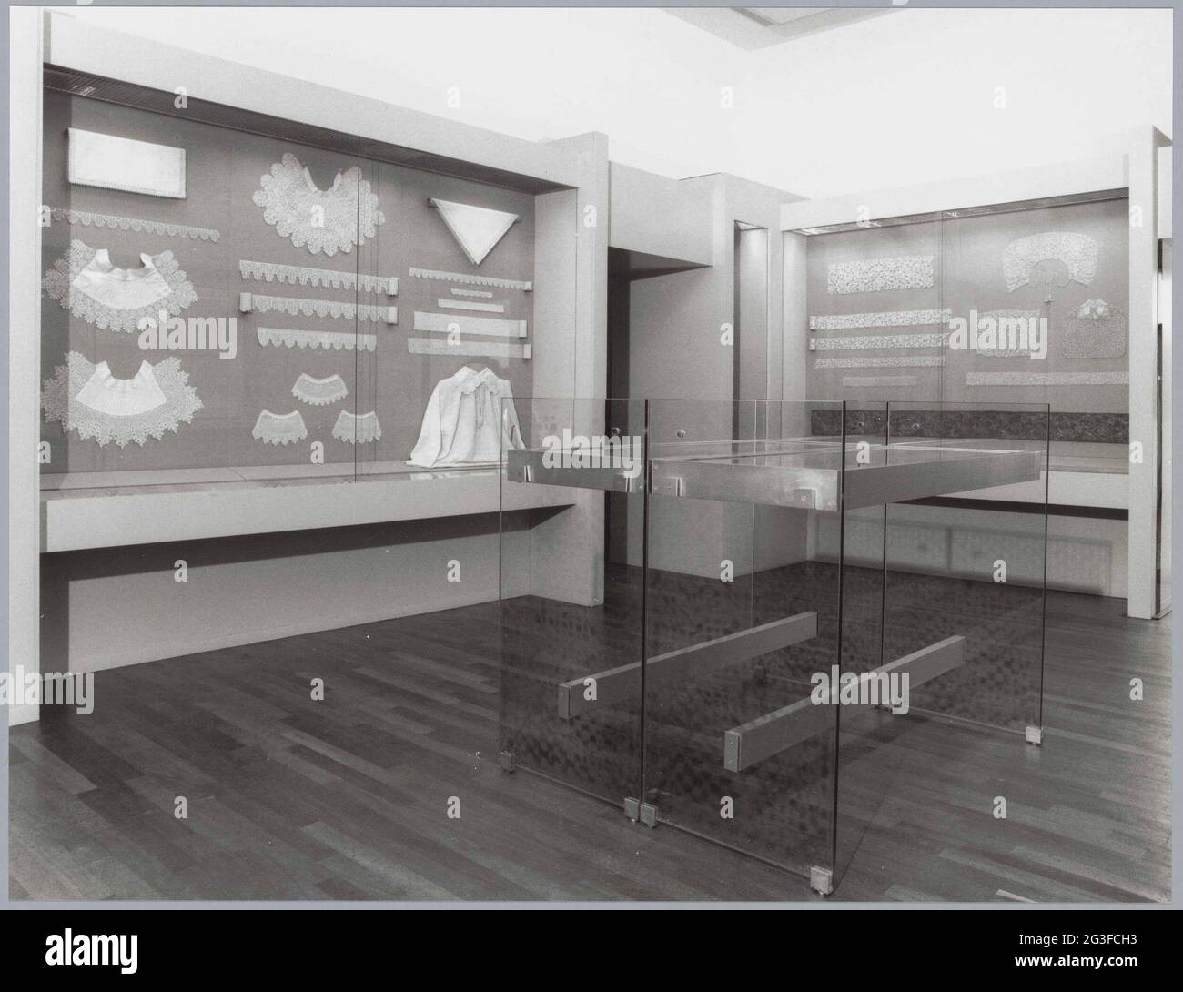 Room with lace objects in showcases; Lace arrangement Stock Photo - Alamy