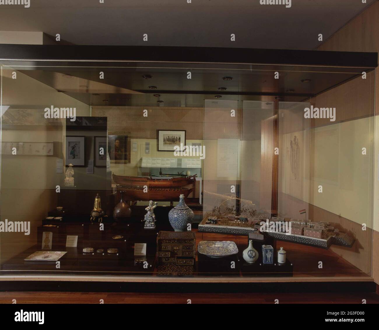 Room (presumably 107) with showcases containing a model of the island ...