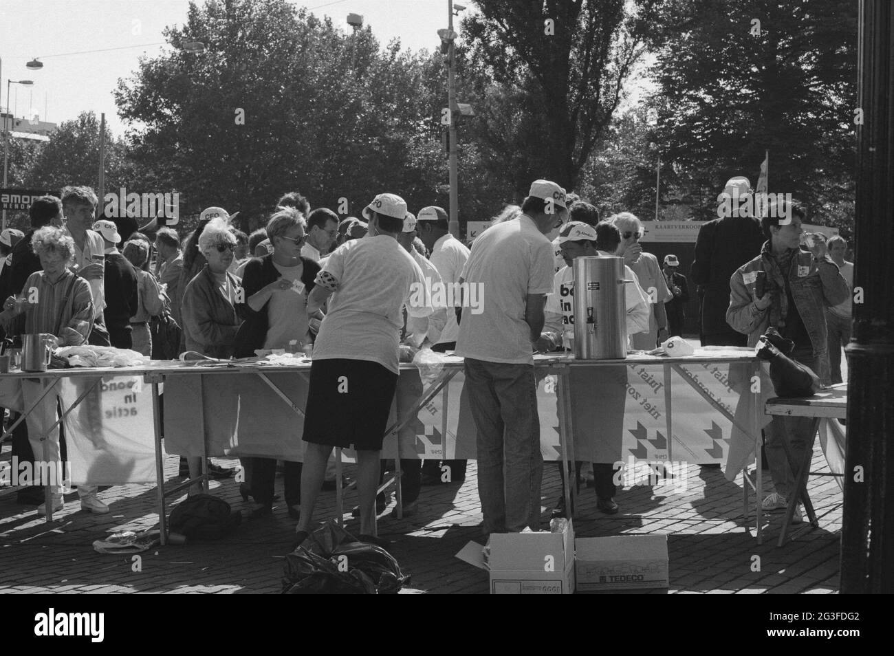 Group of people at tables; Strike Stock Photo - Alamy