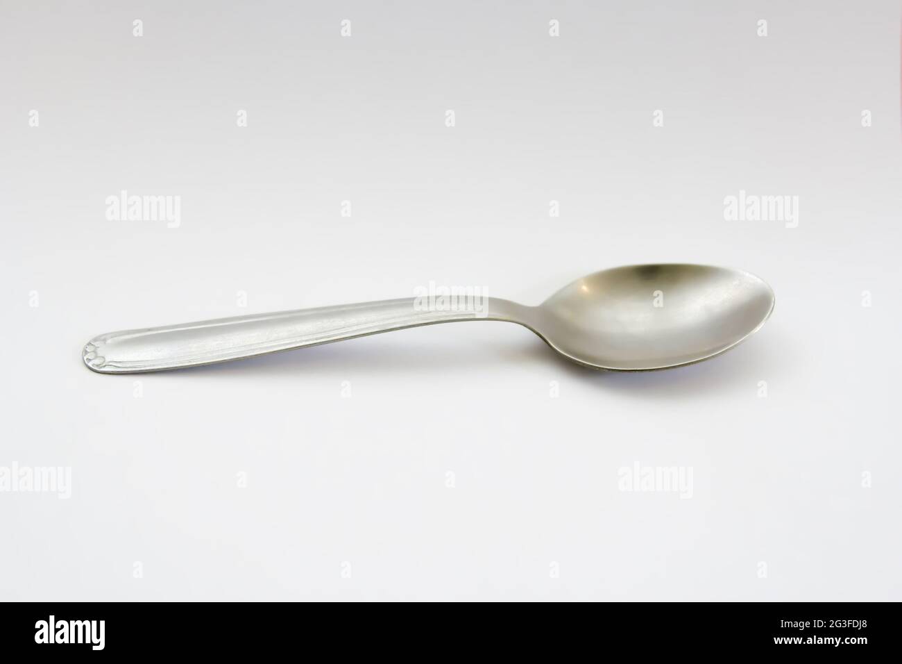 Spoon on white background Stock Photo - Alamy