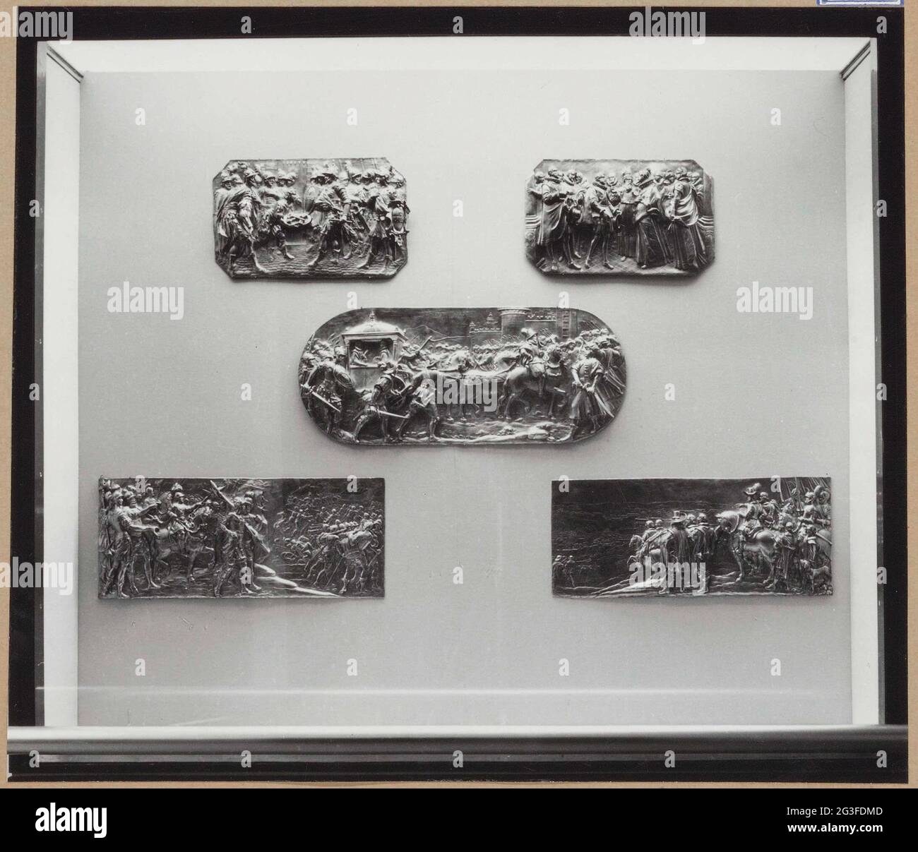 Showcase with metal objects: five baseliogs of driven silver; Halls of ...