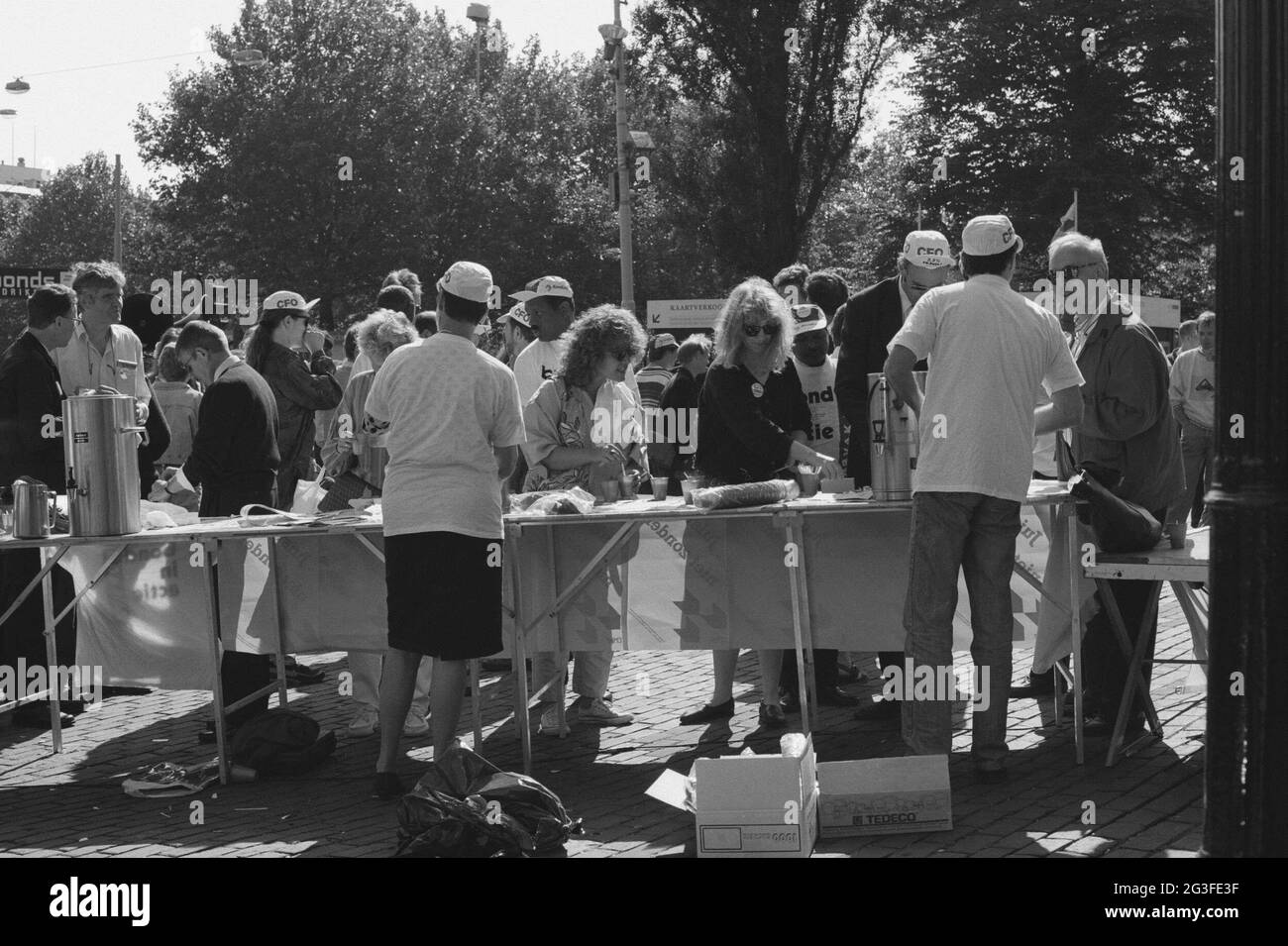 Group of people at tables; Strike Stock Photo - Alamy