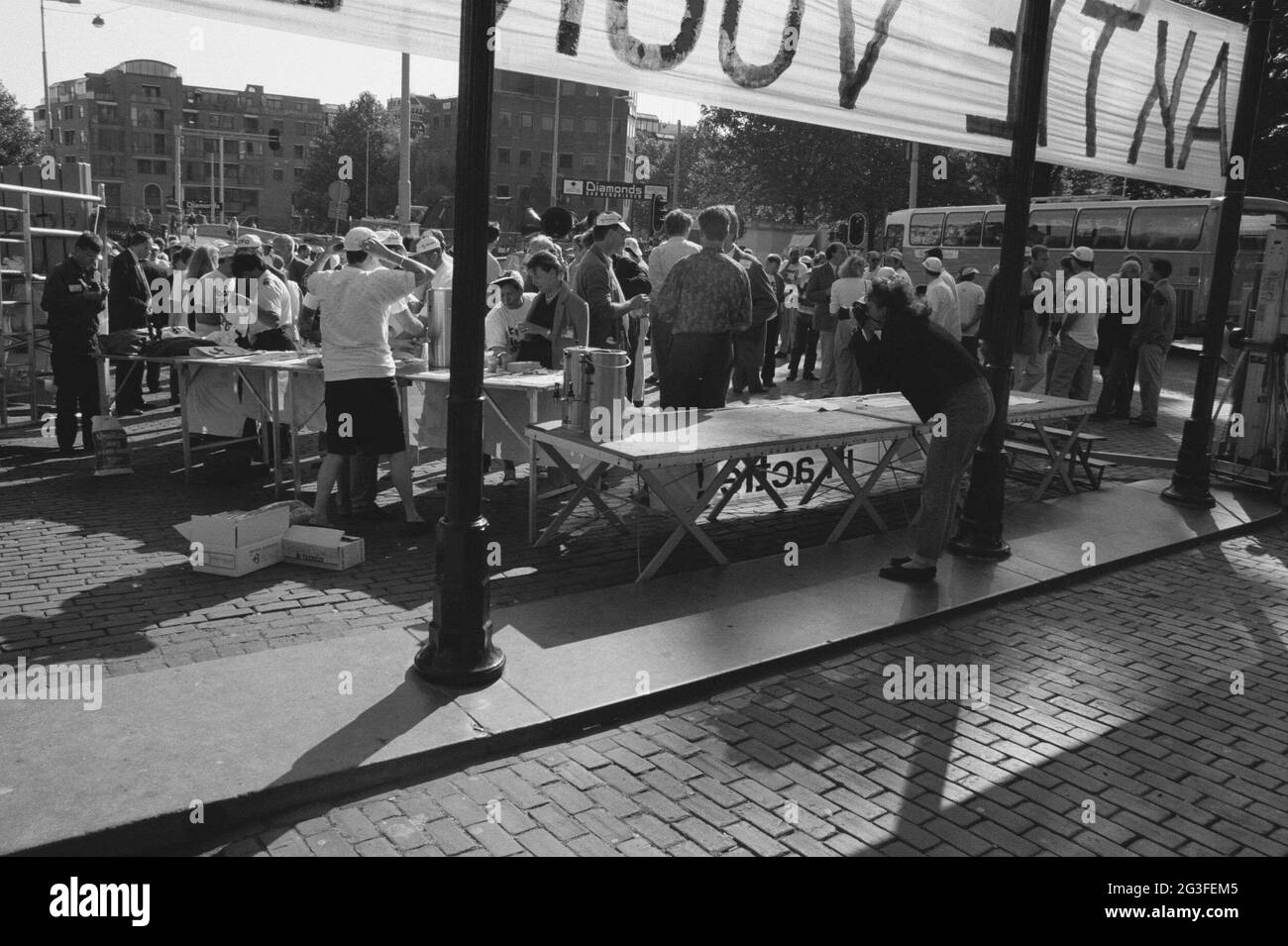 Group of people at tables; Strike Stock Photo - Alamy