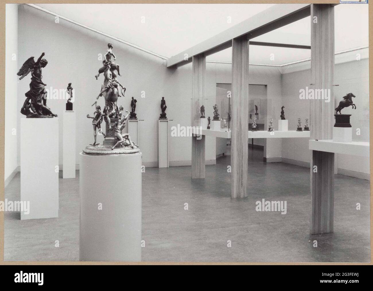 Room with bronze sculptures in showcases and on pedestals; Masters of ...