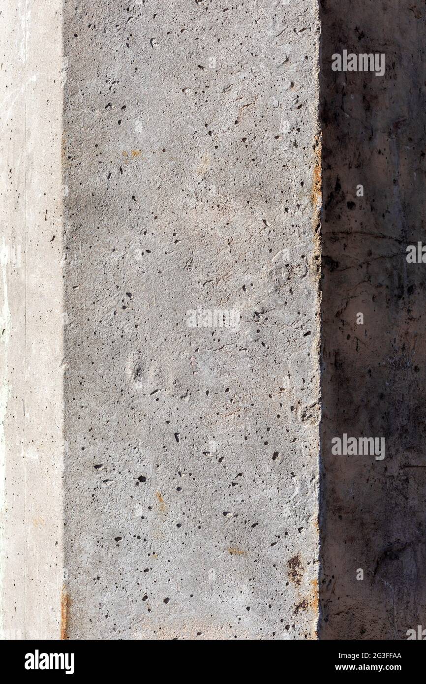 Close-up photo of a concrete hexagonal column. Pores on the concrete ...
