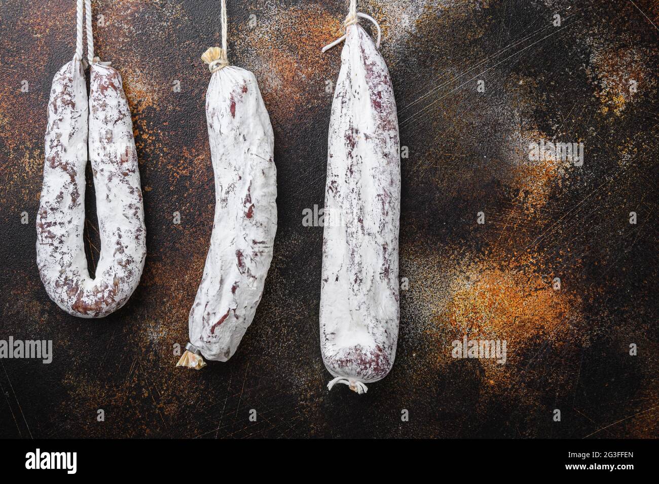 Smoked sausages hanging on metal hi-res stock photography and images ...