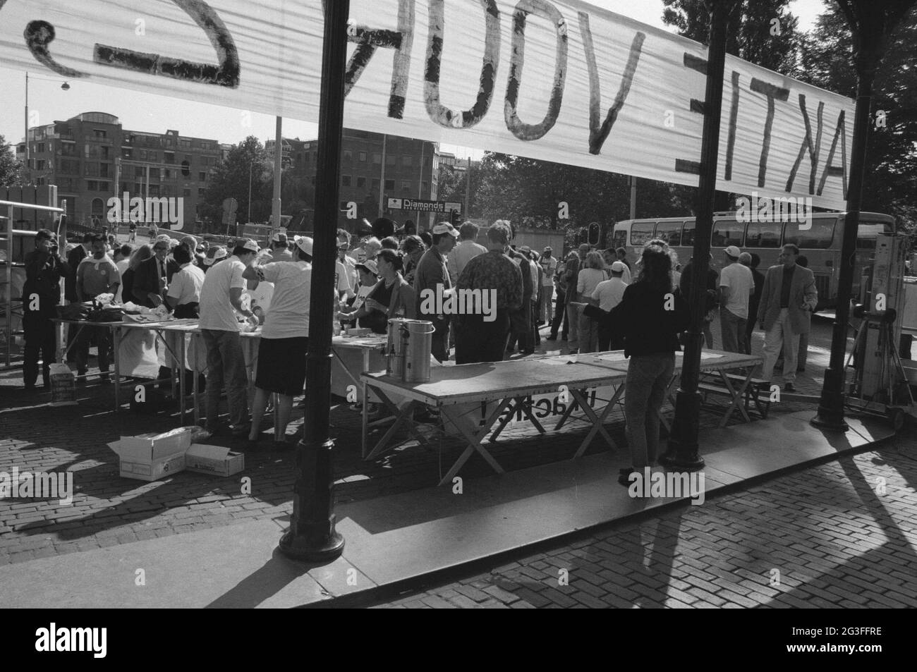 Group of people at tables; Strike Stock Photo - Alamy