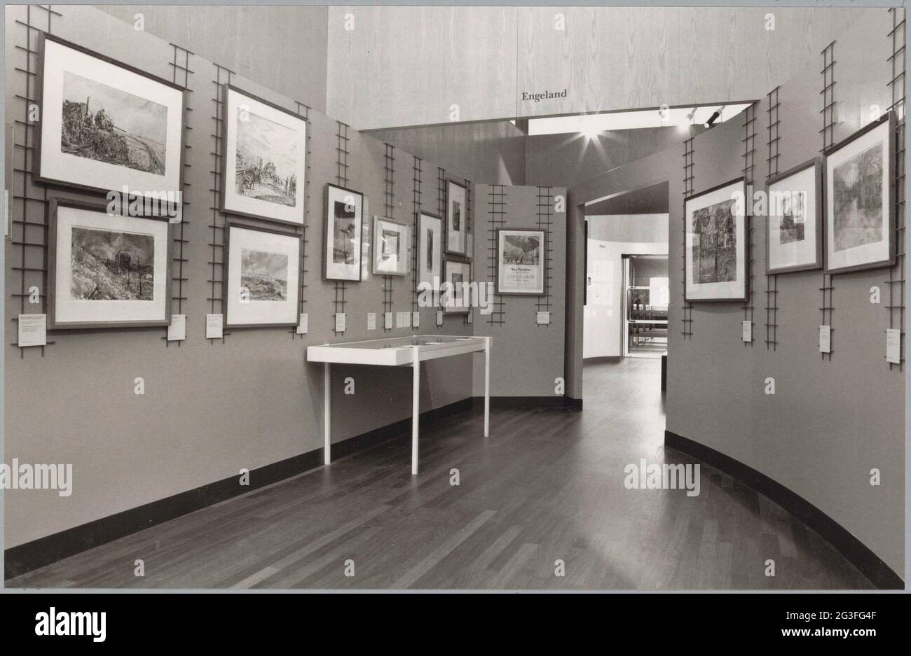 Room with drawings and in the middle behind a poster; Exhibition war ...