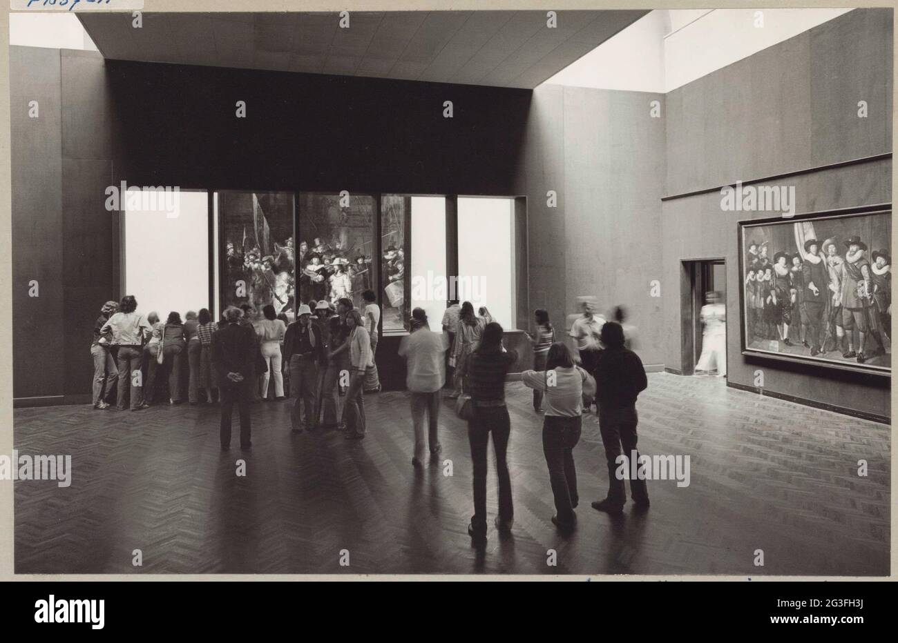 Night vandel room with nightwatch behind a partition wall and watching ...