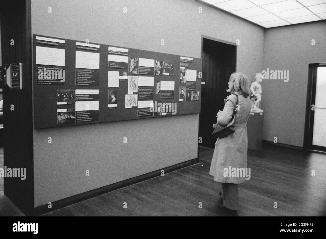 Woman looks information panels hi-res stock photography and images - Alamy