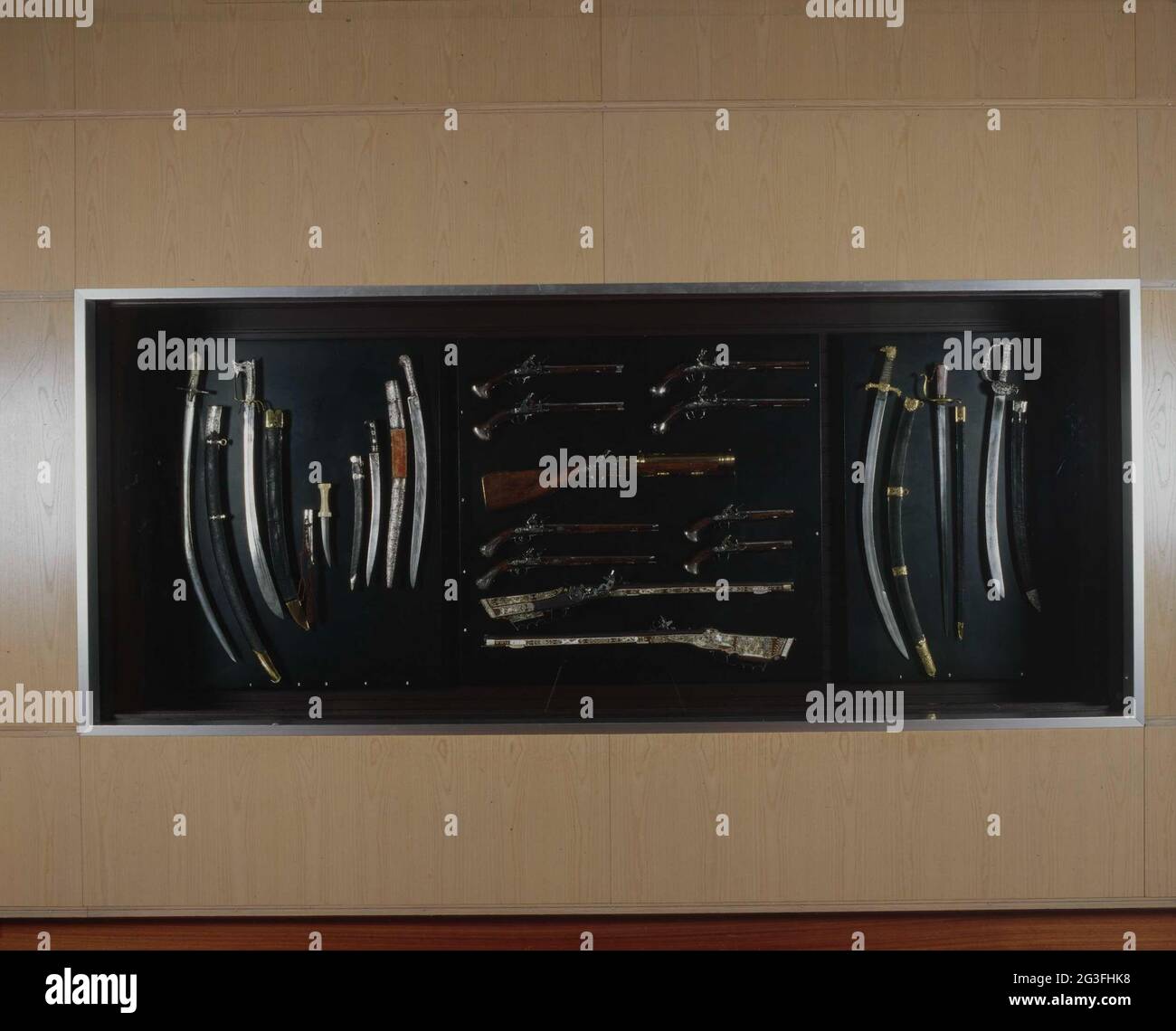 Showcase in room 104 with weapons (sabers and firearms); Setup of Dutch ...