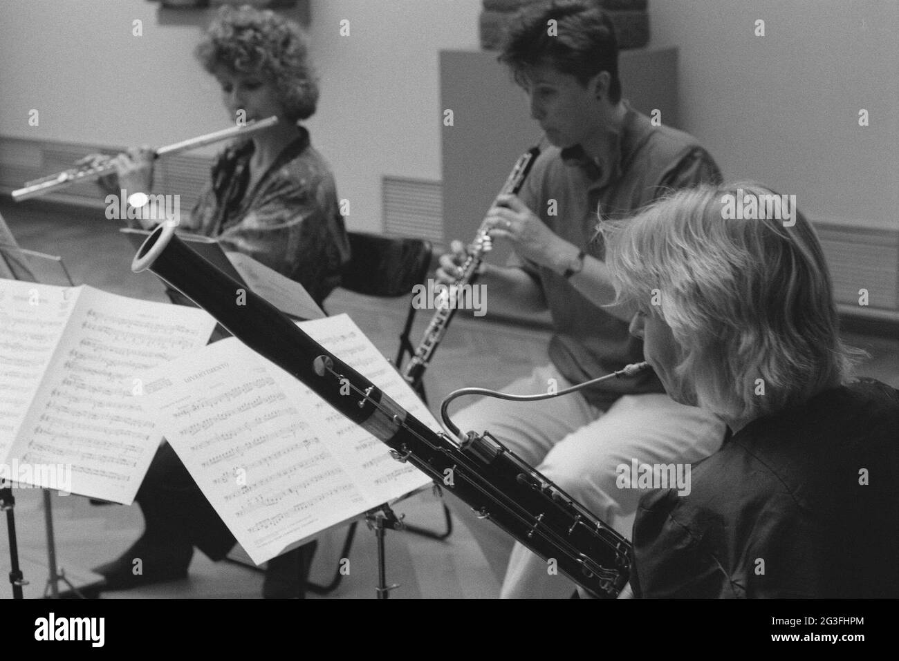 Three Musicians Seated High Resolution Stock Photography and Images - Alamy