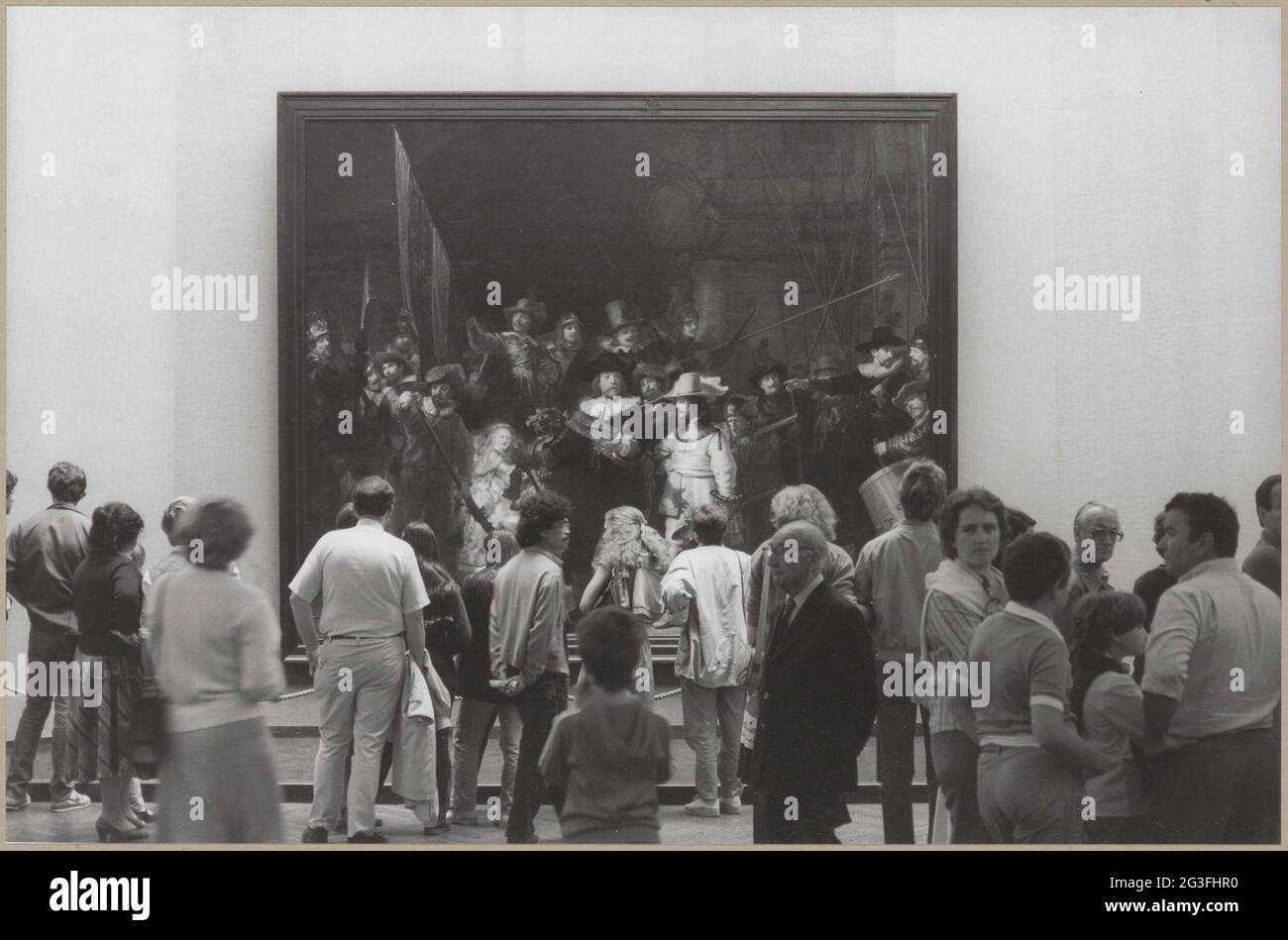 Visitors standing for the night watch; Room with the night watch Stock ...