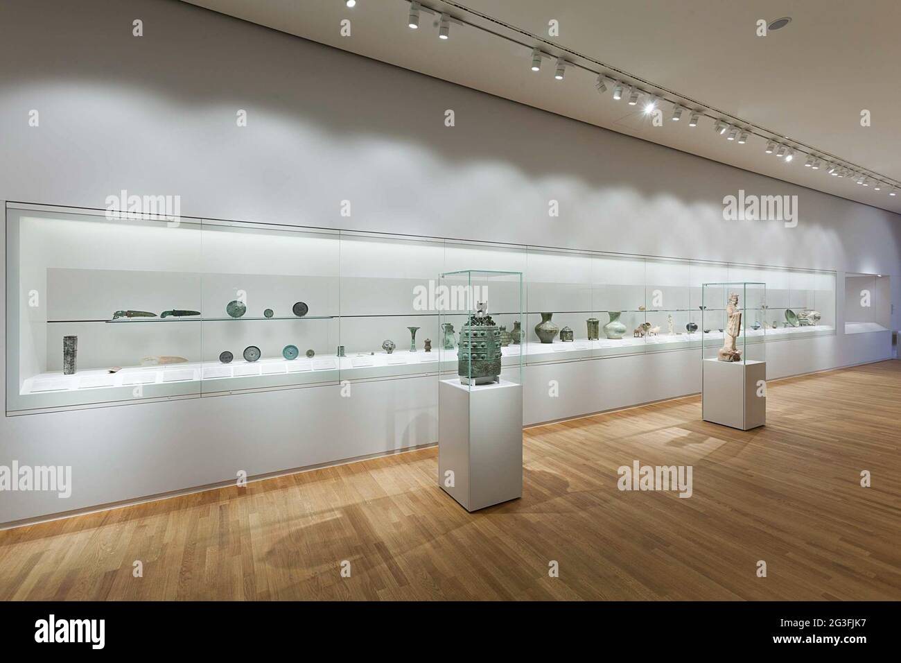 Room with showcases with objects in the Asian pavilion, on the left a ...