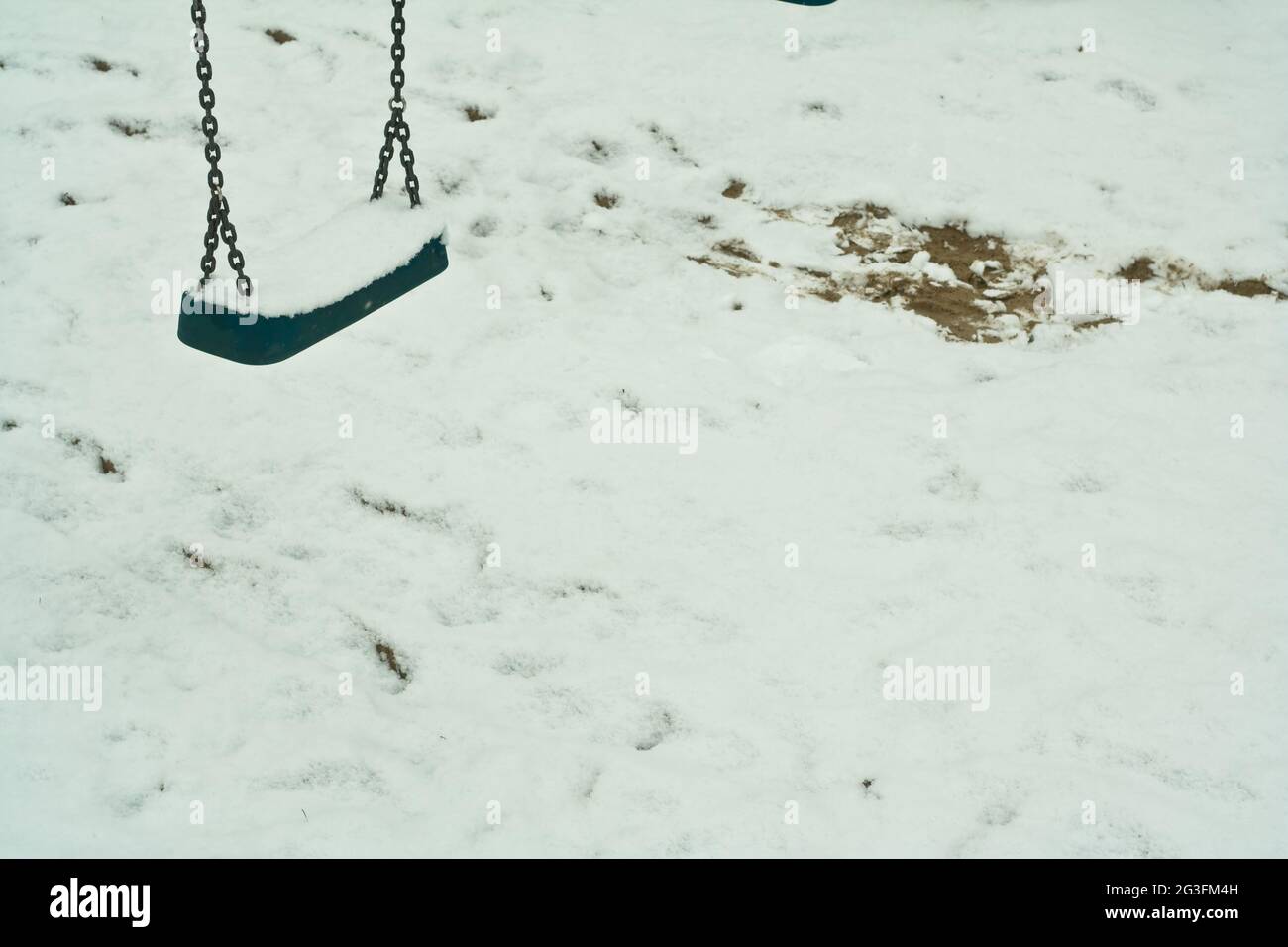 Swing set, winter Stock Photo - Alamy