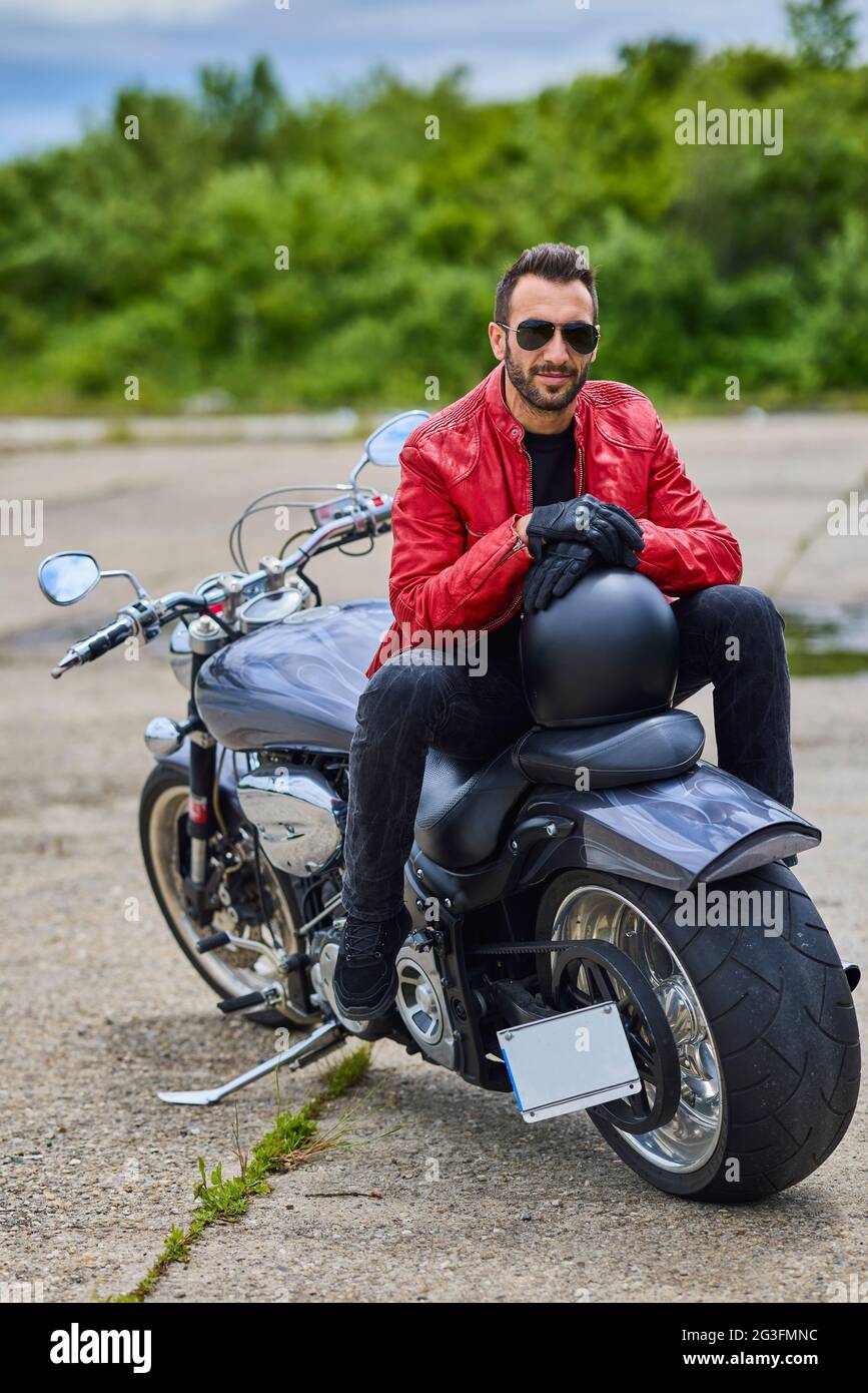 Man standing pose with cycle hi-res stock photography and images - Alamy