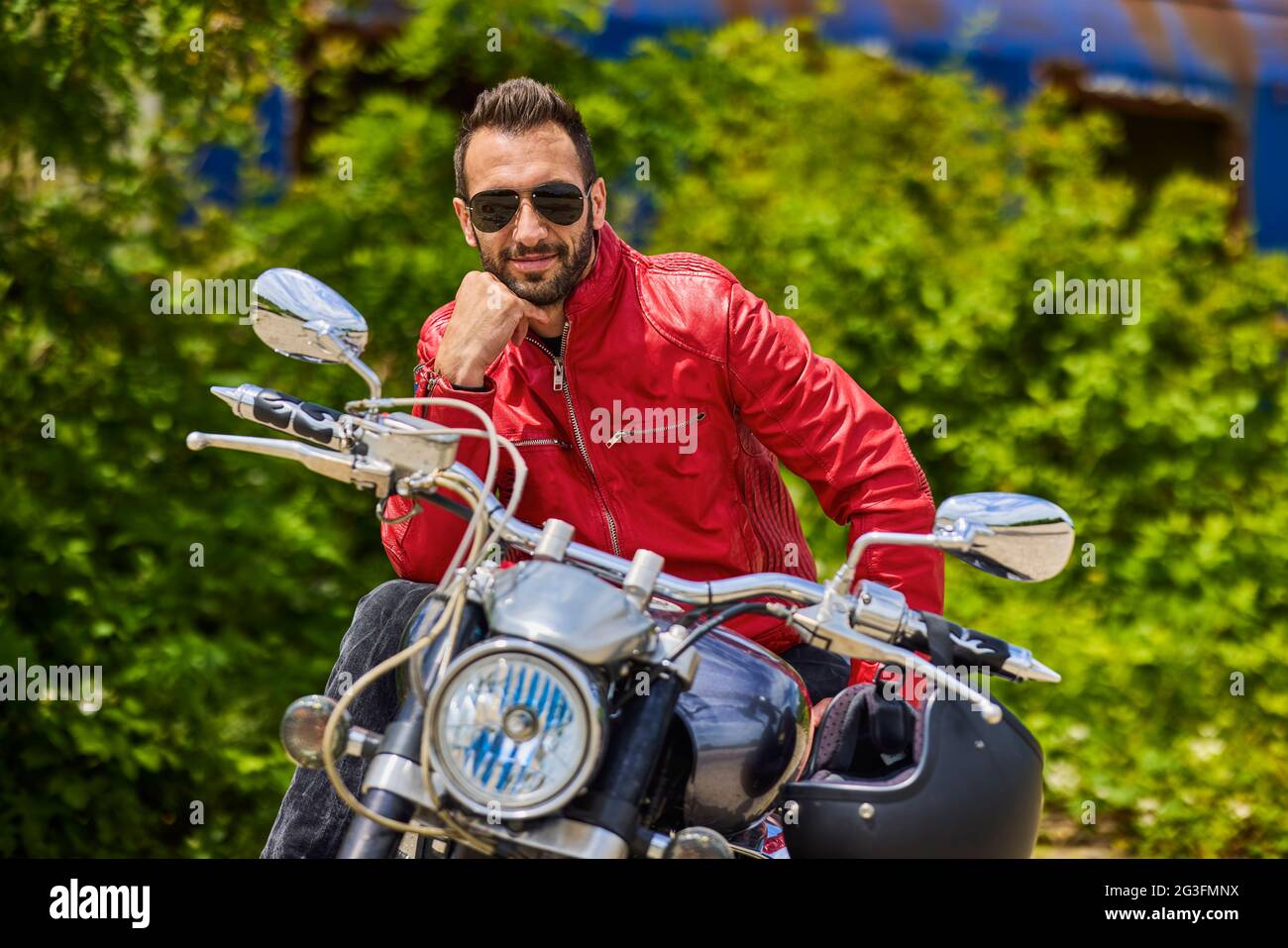 Man standing pose with cycle hi-res stock photography and images - Alamy