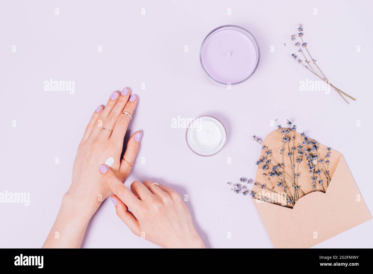 Home spa relaxing procedures, female hands with manicure apply ...