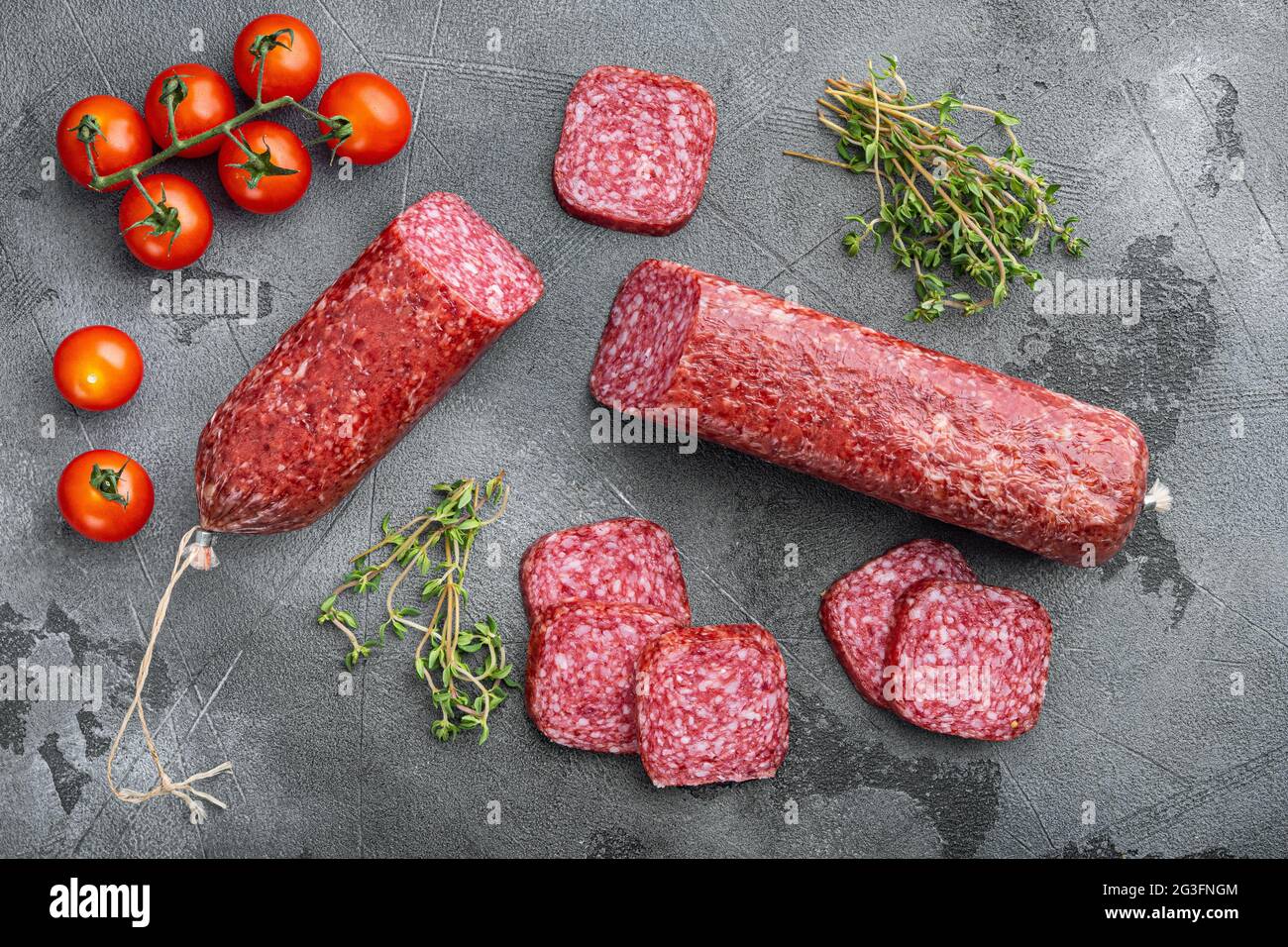 Sliced salami set, on gray stone table background, top view flat lay ...