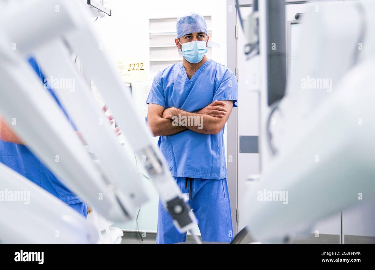 Health Secretary Humza Yousaf watches a surgical robot at work at ...
