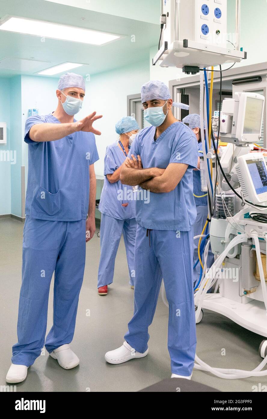 Health Secretary Humza Yousaf (right), with consultant surgeon Campbell ...