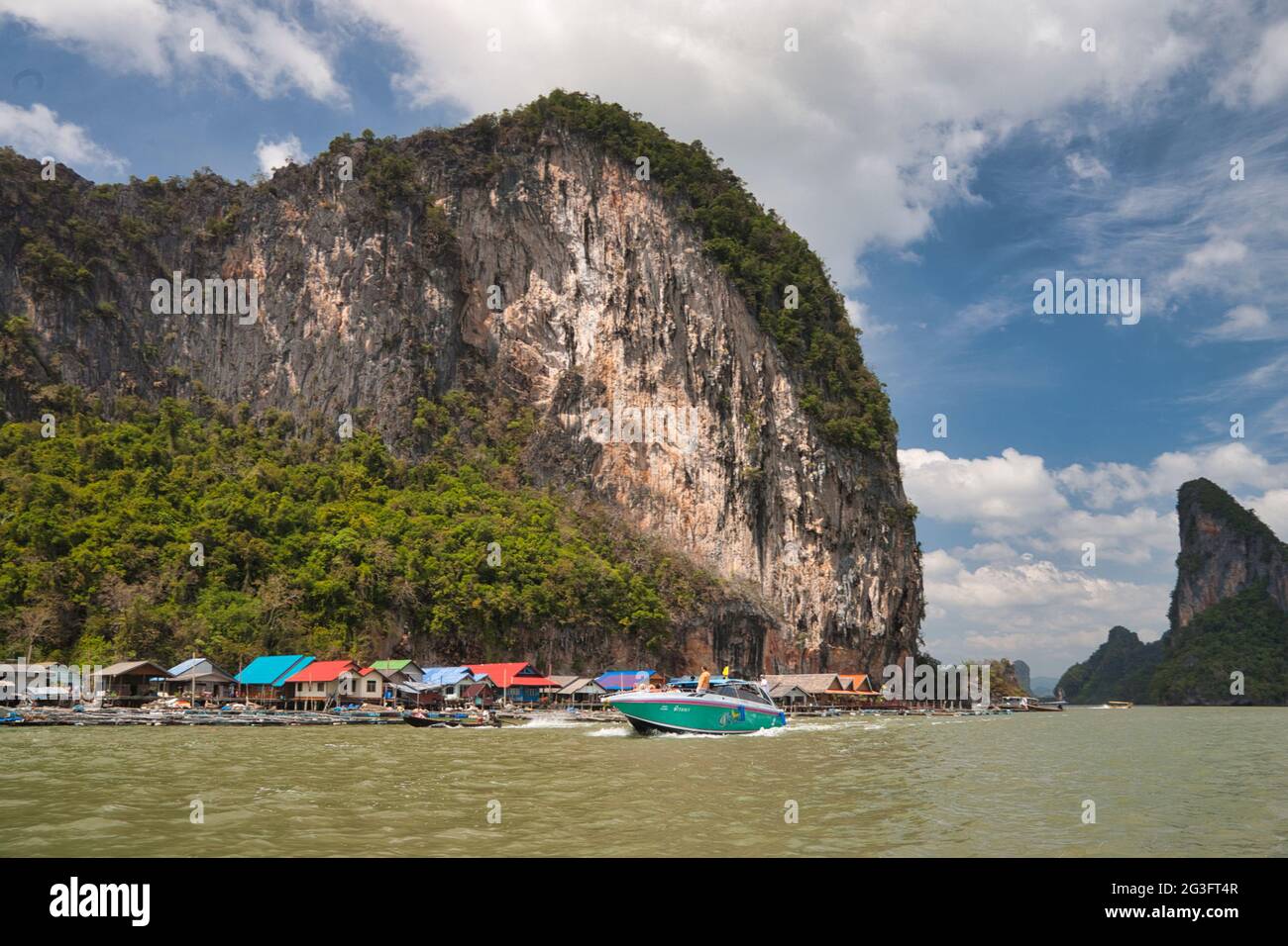Spectacular natural rock formations and a water village built on stilts ...
