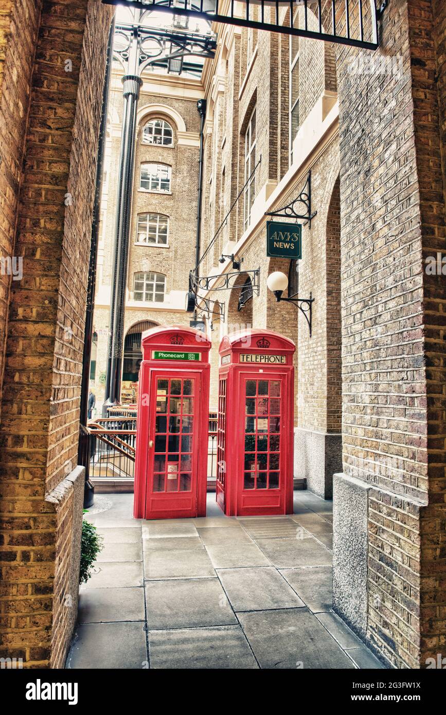 London, UK. Old Red Telephone Booth on a city street Stock Photo - Alamy
