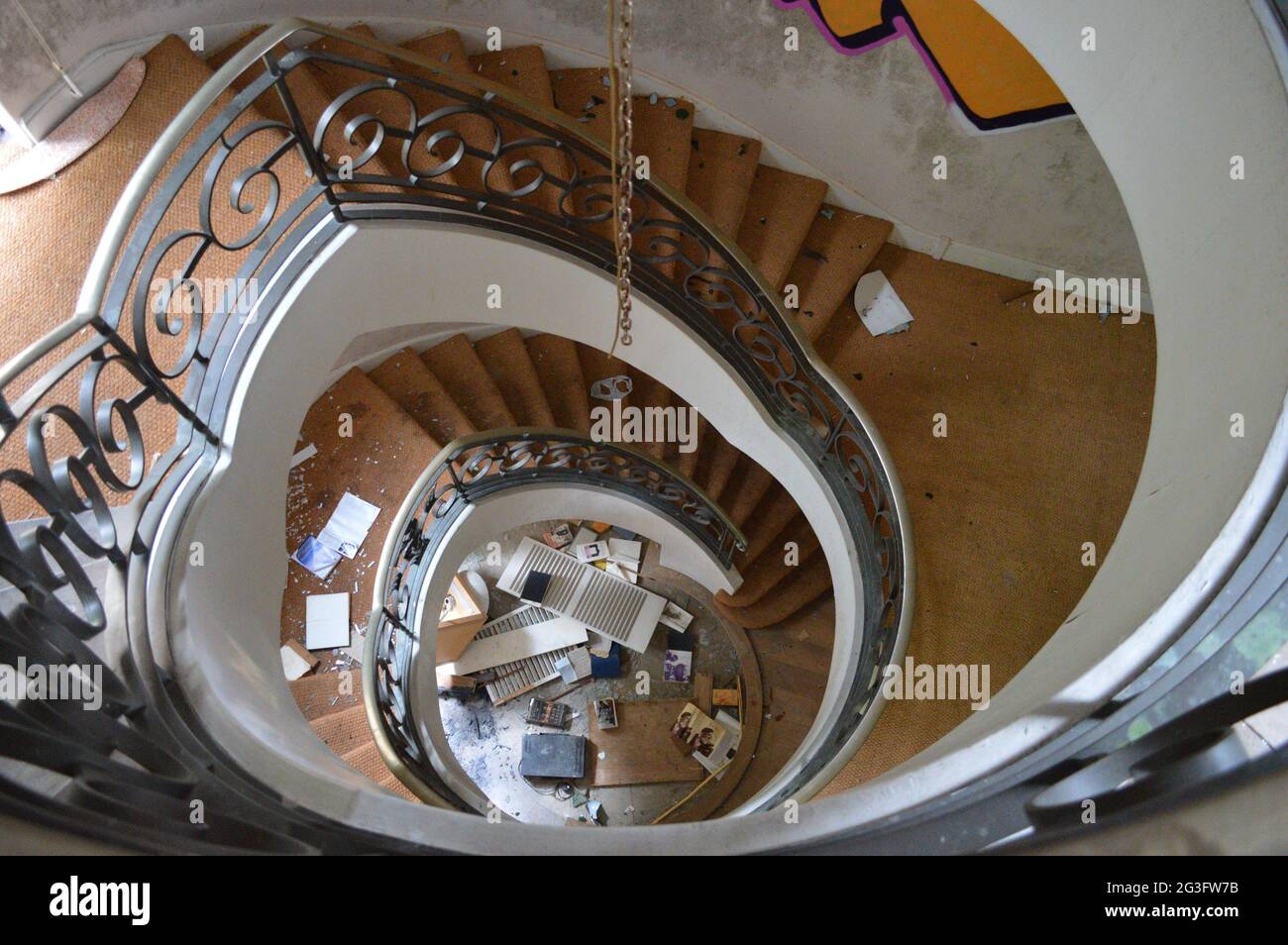 Inside the home was a huge spiralling staircase. VIRGINIA WATER, UK ...