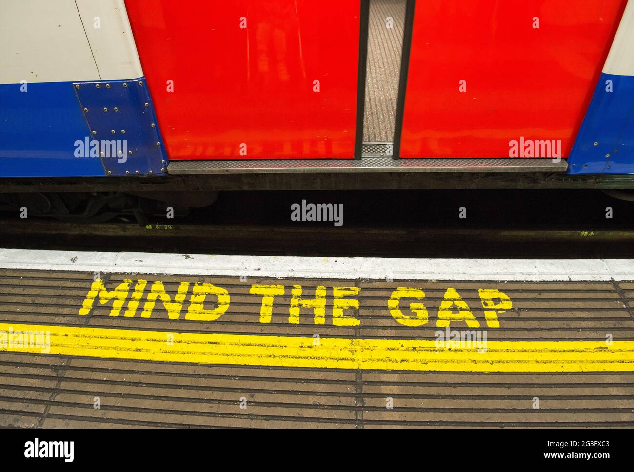 Mind the gap, warning in the London underground Stock Photo - Alamy