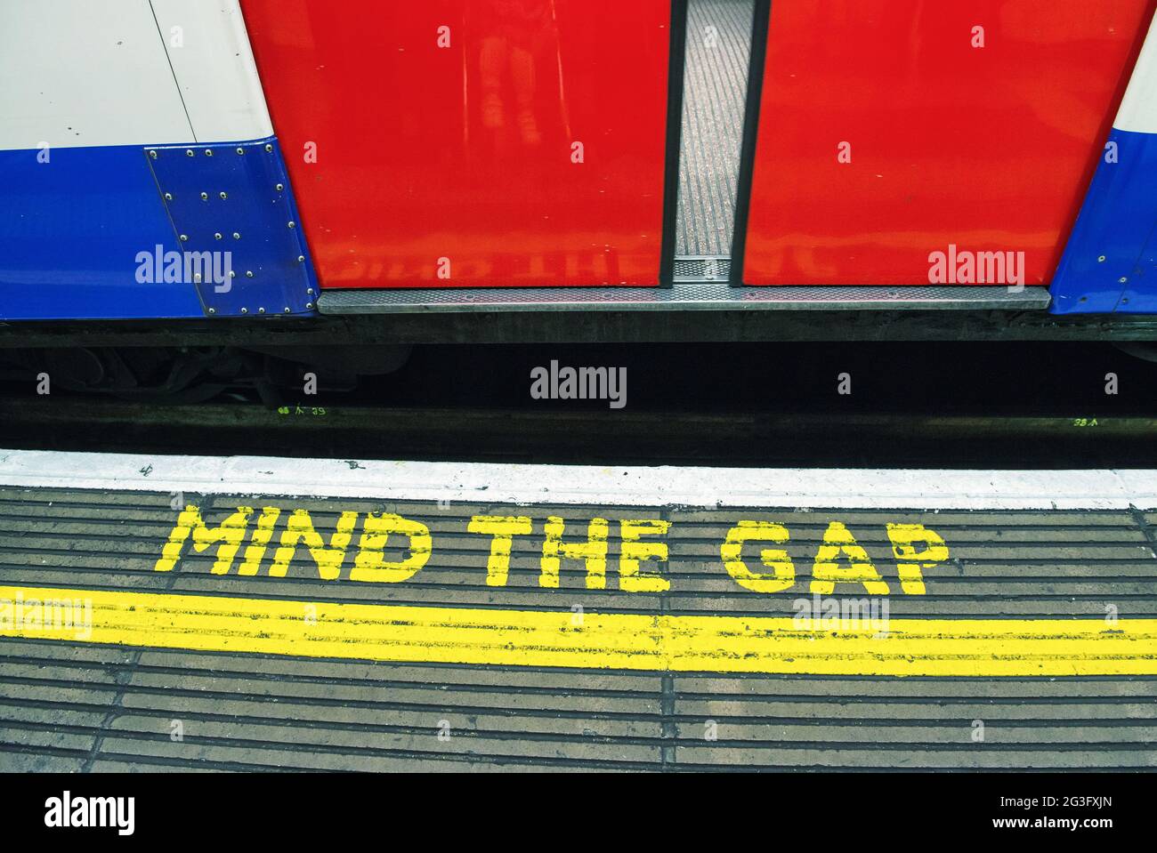 Mind the gap, warning in the London underground Stock Photo - Alamy