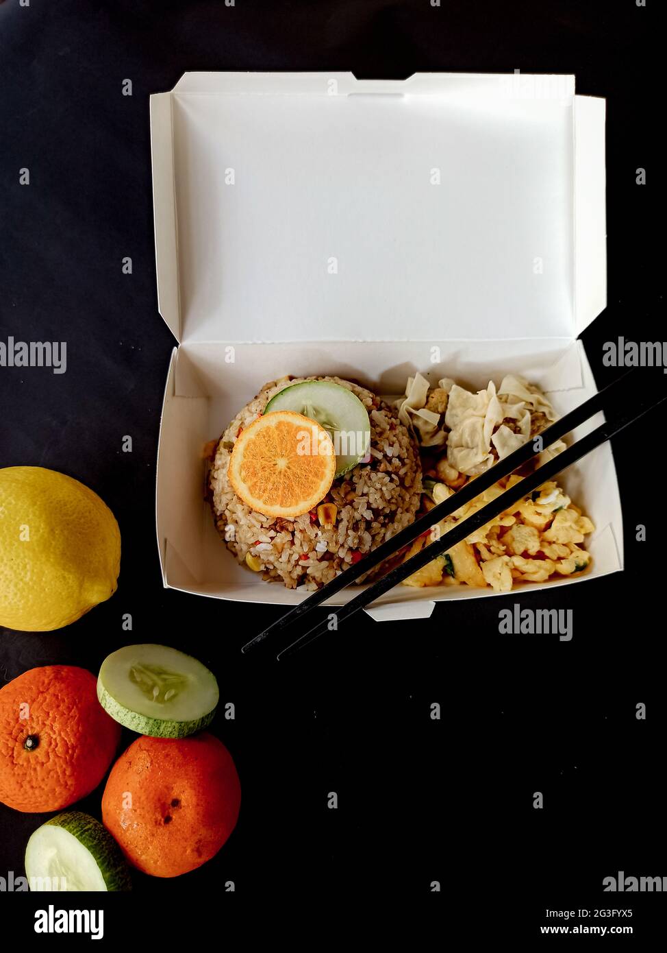 Homemade Chao Rice with lumpia and egg Stock Photo - Alamy