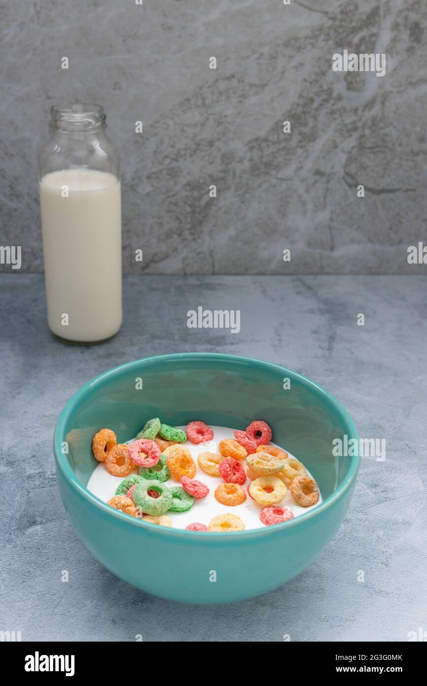 Breakfast with colored cereal served in a colored bowl Stock Photo - Alamy