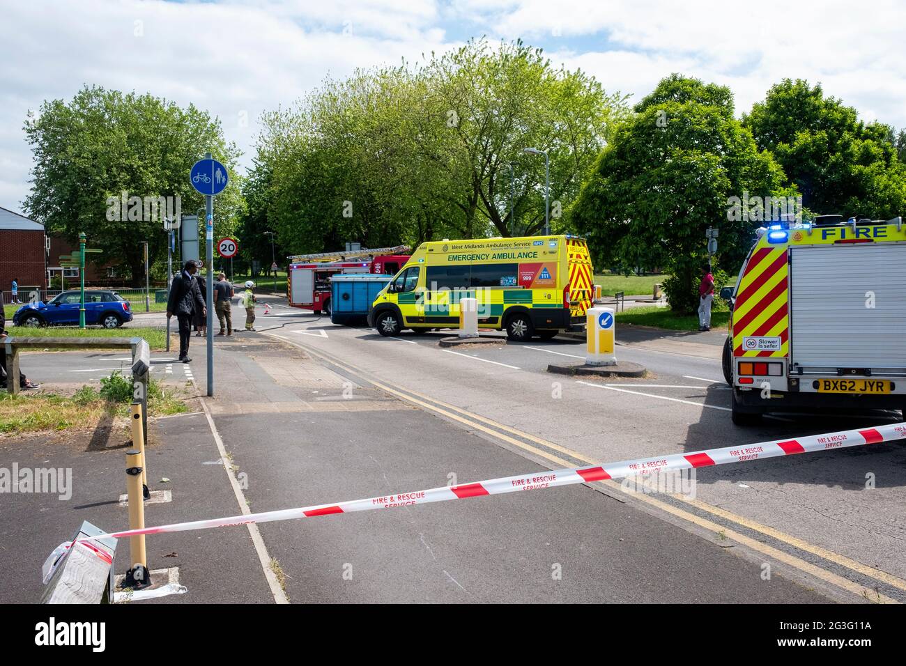 Emergency services block off road due to accident involving overturned ...