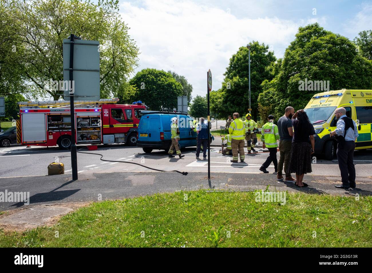 Emergency services block off road due to accident involving overturned ...