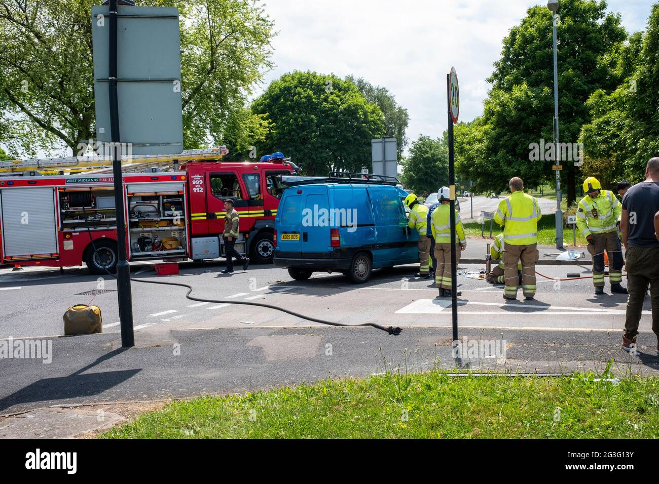Emergency services block off road due to accident involving overturned ...