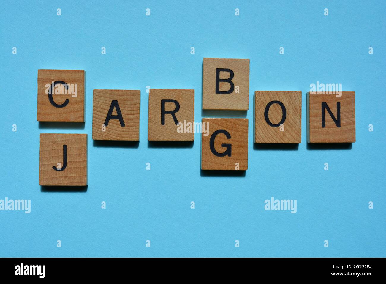Carbon Jargon, words in wooden alphabet letters isolated on blue ...