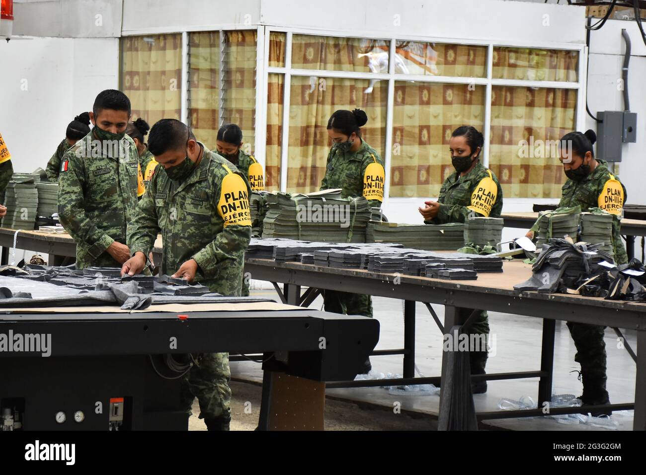 To produce military uniforms hi-res stock photography and images - Alamy